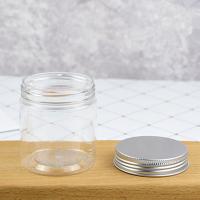 China Food Grade PET Plastic Cans 55ml to 360ml with Silver Lids Transparent Clear Packaging for sale