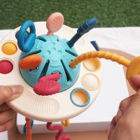 China Baby Sensory Montessori Silicone Pull String Toy 4.7x4.7x9.5cm Travel Teether for sale