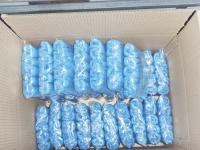China Light Blue Disposable Shoe Covers Elasticized Seam Fluid Resistant With Textured Tread for sale