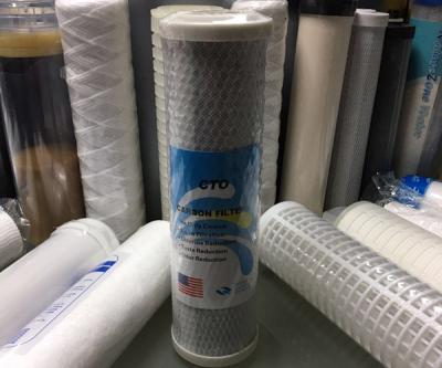 China 10 Inch 1 Micron CTO Activated Carbon Water Filter Cartridge Coconut Carbon Block 68mm OD for sale