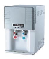 China Silver Tabletop Filtered Water Dispenser with 6.5L Tank Capacity and Compressor Cooling for Hot & Cold Drinking Water for sale