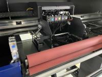 China CMYK WV3 Print Heads One-Pass DTF UV Printer 60cm Roll-to-Roll Digital Transfer Film Machine for sale