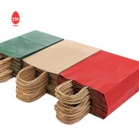 China 3x8.5 Inches Gift Packing Bags SGS  Clothing Packing Kraft  Paper Bag With Handle for sale