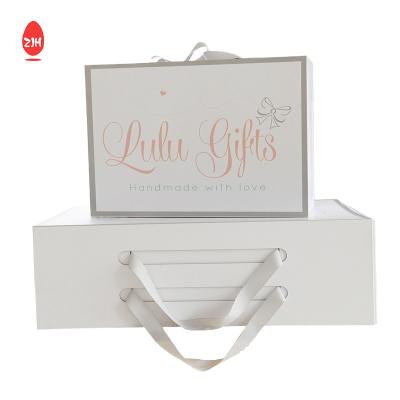 China Deluxe Cardboard Gift Packaging Box Glossy Lamination Rigid Magnetic Paper Box for sale