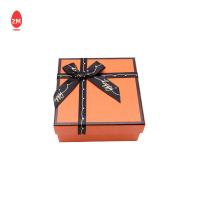 China Durable Orange Bowknot Cardboard Gift Packaging Box Rectangle Storage Cardboard for sale