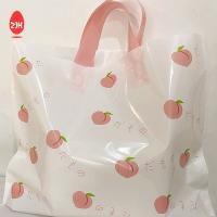 China LDPE Ins Style Gift Packing Bags Clothing Store Peach Pattern Plastic Tote Bag for sale