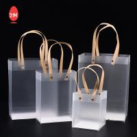 China LDPE Plastic Shopping Bag Cosmetic Dress Transparent Gift Tote Bags for sale