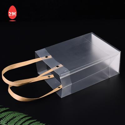 China LDPE Plastic Shopping Bag Cosmetic Dress Transparent Gift Tote Bags for sale