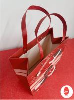 China Cartoon Kraft Paper Gift Packing Bags Custom Printed With Handles for sale