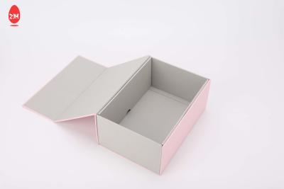 China Paperboard Clothes Shoe Packaging Boxes , Pink Matte Magnetic Gift Box With Ribbon for sale