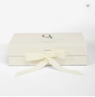 China Custom Logo Recycle White Box Cardboard Folding Packaging Boxes With Ribbon for sale