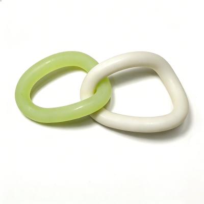 China Greasy Luster Wear Resistant Carbonate Resin Figure Eight Buttons with Customizable Colors for sale