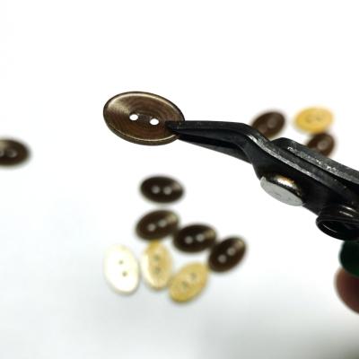 China 8mm - 28mm Oval Two Hole Natural Corozo Buttons With Wood Grain Patterns Customizable for sale