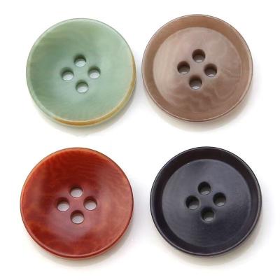 China Customized 4 Hole Natural Corozo Buttons With Subtle Wood Grain Patterns for sale