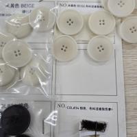 China Customizable Corozo Suit Buttons with Subtle Wood-Grain Patterns and 4-Hole Design for sale