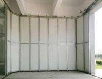 China Side Sliding Insulated Garage Door 25m / S With Vision Windows And Wicket for sale