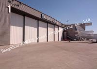 China Hydraulic / Electrical Aircraft Hanger Door And Aviation Building Airplane Bifold Doors Vertical Lifting Systems for sale