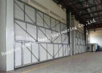 China Manual Folded Push Pull Overhead Industrial Garage Doors Track And Hardware Of Aircraft Hanger for sale