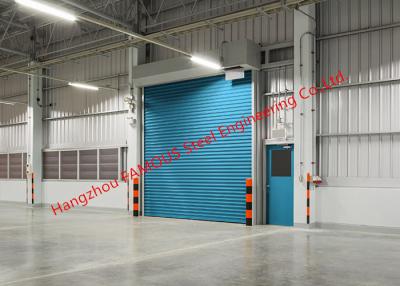 China High-Speed Insulated Rolling Industrial Doors 6000mm x 7500mm with 2.0m/s Opening Speed for Warehouse Use for sale
