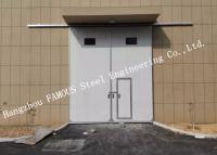 China Sectional Horizontal Sliding Industrial Garage Doors With Access Pedestrian Door For Workshop for sale