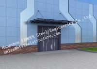 China Automatic Glass Sectional Industrial Garage Door with 5-9mm Glass Panels and Aluminum Frame for Commercial Buildings for sale