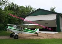 China Vertical Bi-Fold Hangar Door System with 6-9 M/min Opening Speed and 700+ Pa Wind Load Capacity for sale