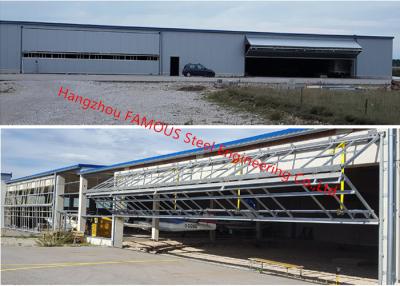 China Vertical Bi-Fold Hangar Door System with 6-9 M/min Opening Speed and 700+ Pa Wind Load Capacity for sale