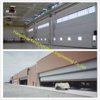 China Sectional Lift Door Vertical Panel Lifting Industrial Sectional Door For Garage Use for sale