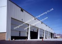 China Sectional Lift Door Vertical Panel Lifting Industrial Sectional Door For Garage Use for sale