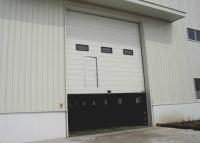 China Frequency Controlled Vertical Lifting Fabric Industrial Doors For Large Openings for sale