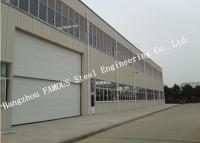 China Frequency Controlled Vertical Lifting Fabric Industrial Doors For Large Openings for sale