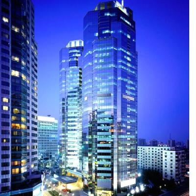 China Prefabricated Hot Dip Galvanized Commercial Steel Buildings with 90m Span and 4-Story Height Using Q235/Q345 Steel for sale