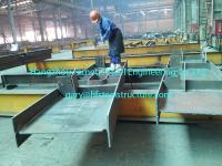 China Pre Engineering Commercial Steel Buildings H Section Beam Coated Grey Painting for sale
