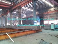 China Pre Engineering Commercial Steel Buildings H Section Beam Coated Grey Painting for sale
