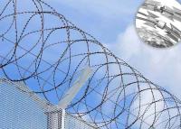 China CBT60 CBT65 Concertina Coil Fencing Wire - 30mm Blade Tip-to-Tip, 42mm Center Spacing for Perimeter Security for sale