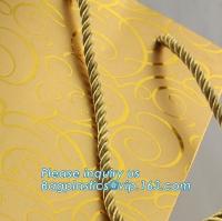 China Printed Luxury Wide Base Brown Kraft Paper Carrier Bag,coating black luxury paper carrier bag for printing with ribbon for sale