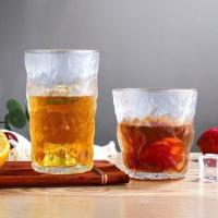 China Irregular Glass Drinking Cups 320ml Glacier Heavy Base Highball Glasses for sale