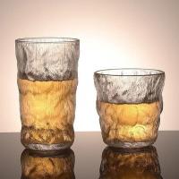 China Irregular Glass Drinking Cups 320ml Glacier Heavy Base Highball Glasses for sale