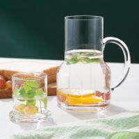 China Engraved Hand Blown Glass Carafe 30 Oz Clear Bedside Water Pitcher With Handle for sale