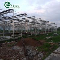 China Large Glass Covered Garden Greenhouses for Versatile Planting Options for sale