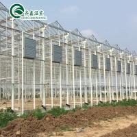 China Large Glass Covered Garden Greenhouses for Versatile Planting Options for sale