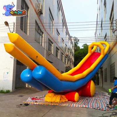 China Commercial Waterproof Inflatable Pontoon Slide 2-Lane Racing Water Park for sale