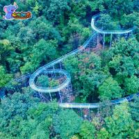 China Custom Glass Water Slide 250m Spiral Outdoor Amusement Equipment for Mountain Parks for sale