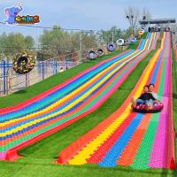 China Custom Outdoor Rainbow Slide Amusement Park Equipment 80-150m Length Dual Lane for sale