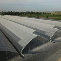 China Double Layer Plastic Film Greenhouse With Cooling System Heating System Shading System Grow Tomatoes for sale