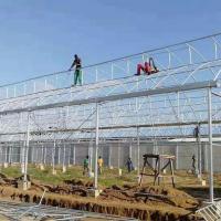 China 40 Mesh Insect Net Covered Multi Span Sawtooth Type Greenhouse  For Rose In Tropical Area for sale