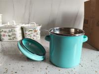 China 900ml Handmade Enamel Grease Container With Stainless Steel Strainer And Handle for sale