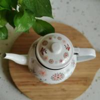 China 150g Flower Theme Enamel Carbon Steel Round Shape Coffee Pot Enamel Teapot Red Enamel Kettle for sale