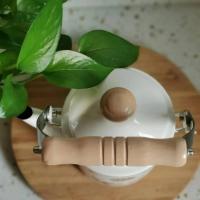 China Flower Theme Enamel Tea Kettle On Steel With Wood Handle And 201 Stainless Steel Rim for sale