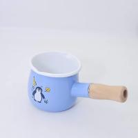 China Pastel Blue Cute Penguin Print Enamel Milk Pot With Wooden Heatproof Handle Small Enamel Saucepan For Heating Milk Baby Food for sale